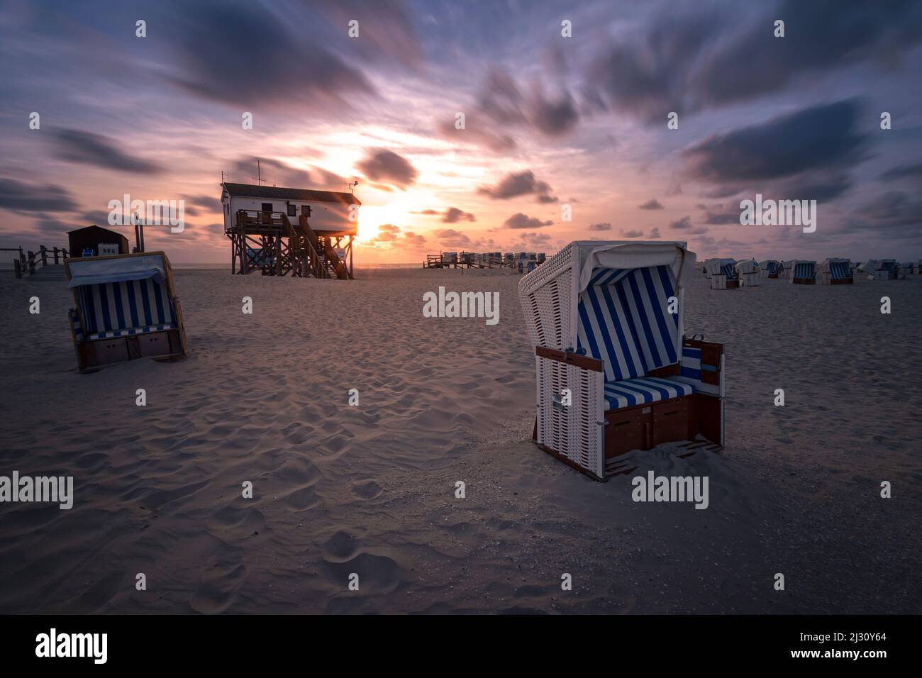 Sunset at the beach of St.Peter-Ording, Schleswig-Holstein, Germany ...