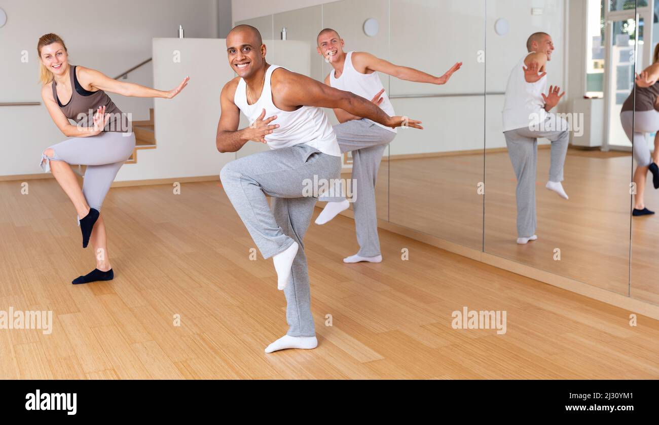 Man dancing at group lesson in studio Stock Photo - Alamy