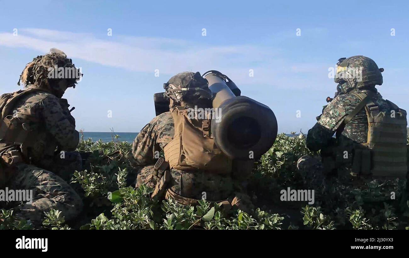 Philippine Marines with Marine Battalion Landing Team 10 and U.S Marines with 1st Battalion, 3d ...