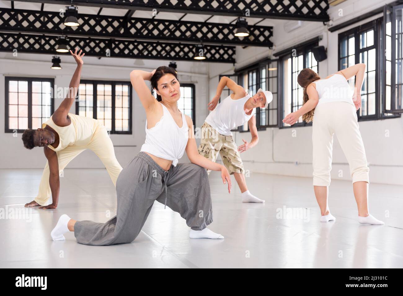 Dancers perform theatrical dance in classroom Stock Photo - Alamy