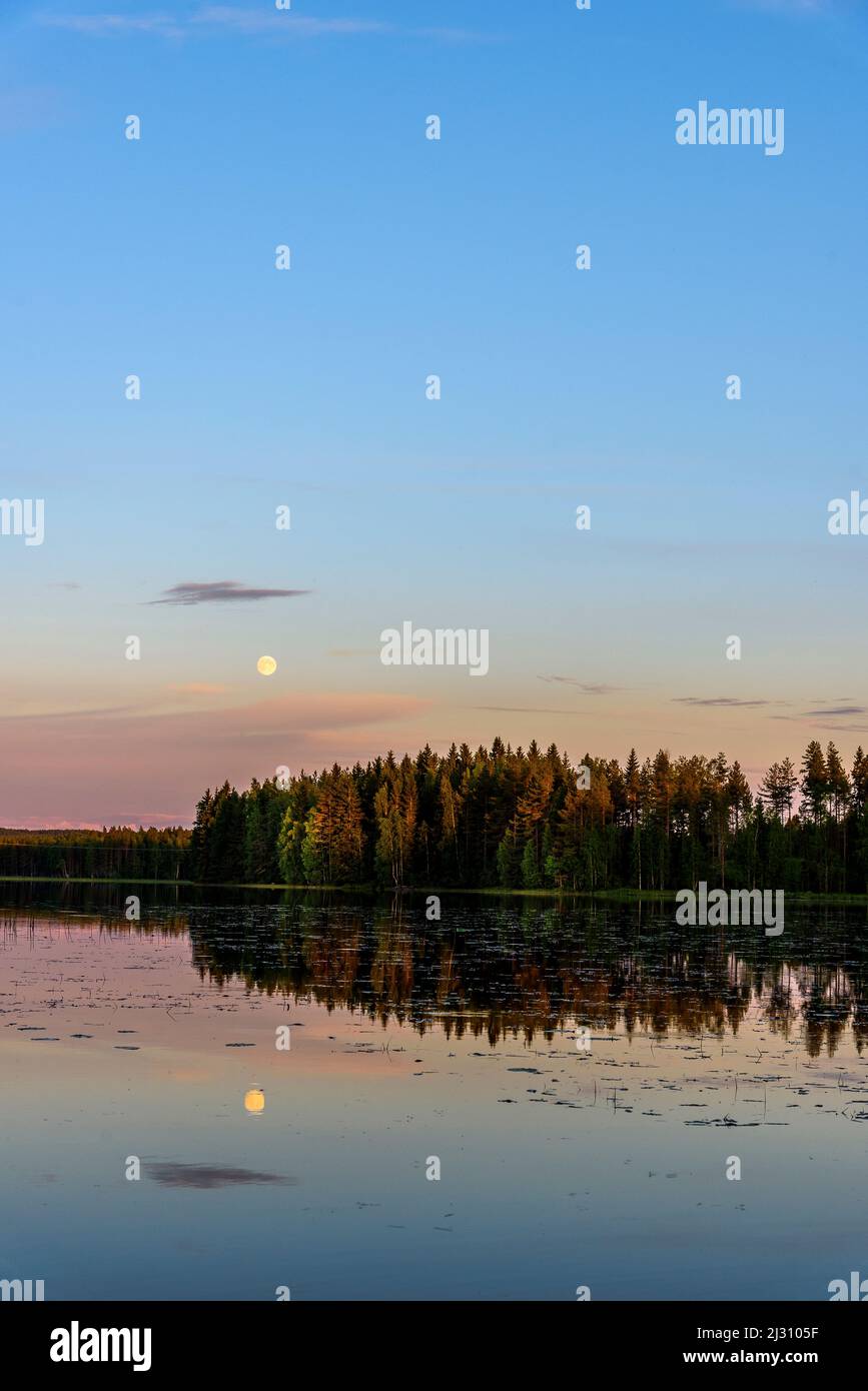 Landscape with a full moon on the Lake District, Finland Stock Photo ...