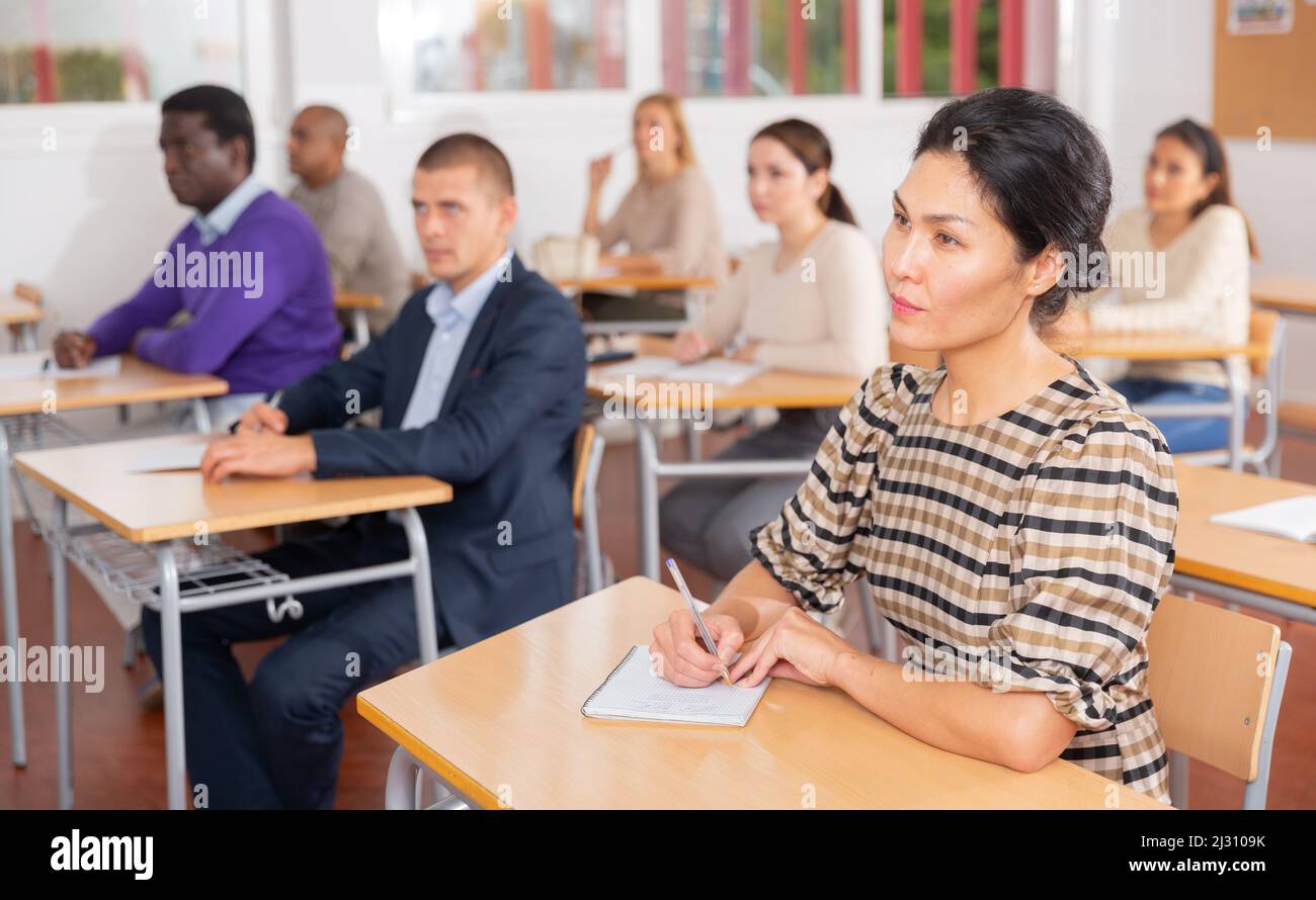Students in advanced training courses in auditorium Stock Photo - Alamy