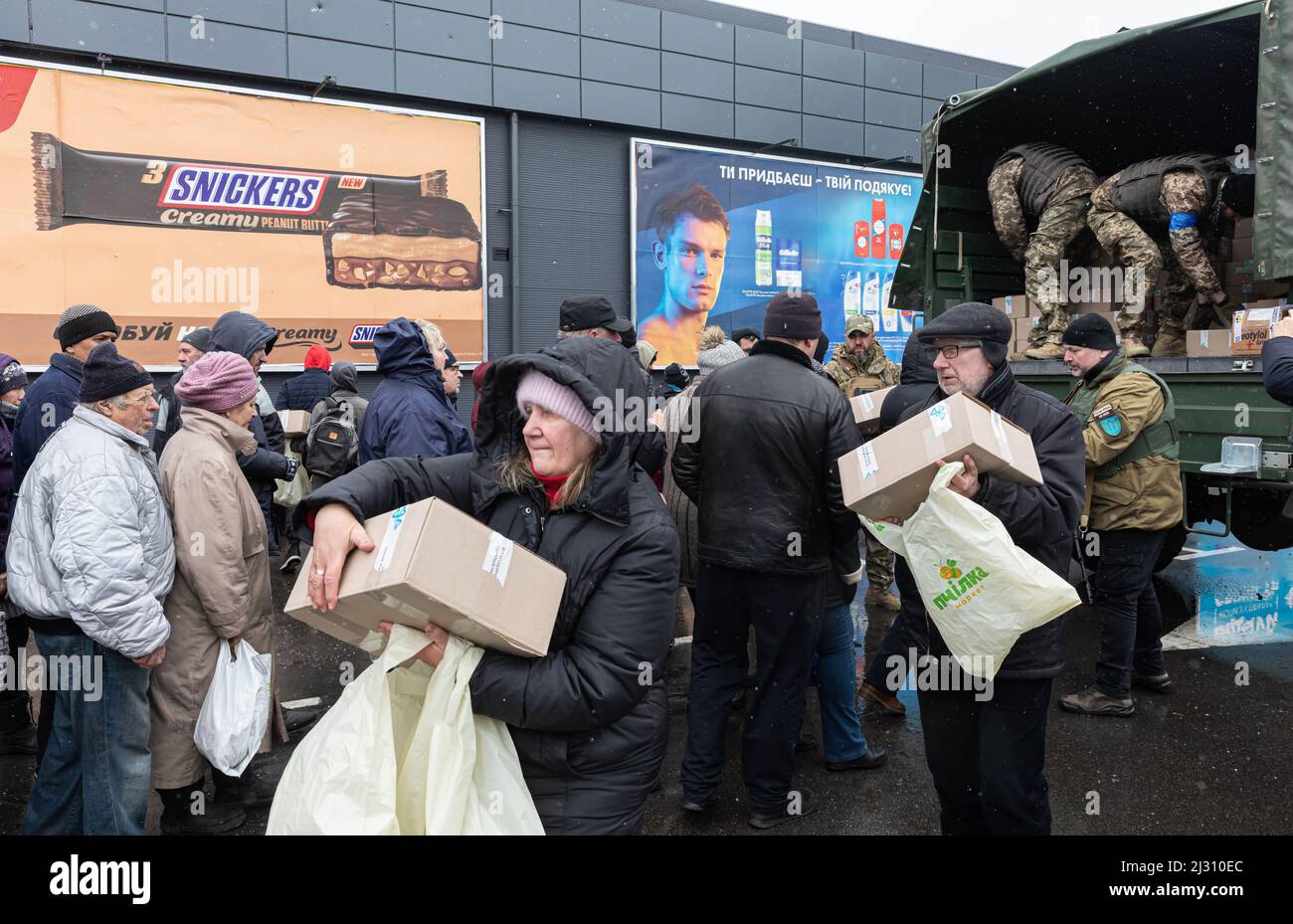 Bucha, Ukraine. 03rd Apr, 2022. Residents of Bucha, receive boxes with ...