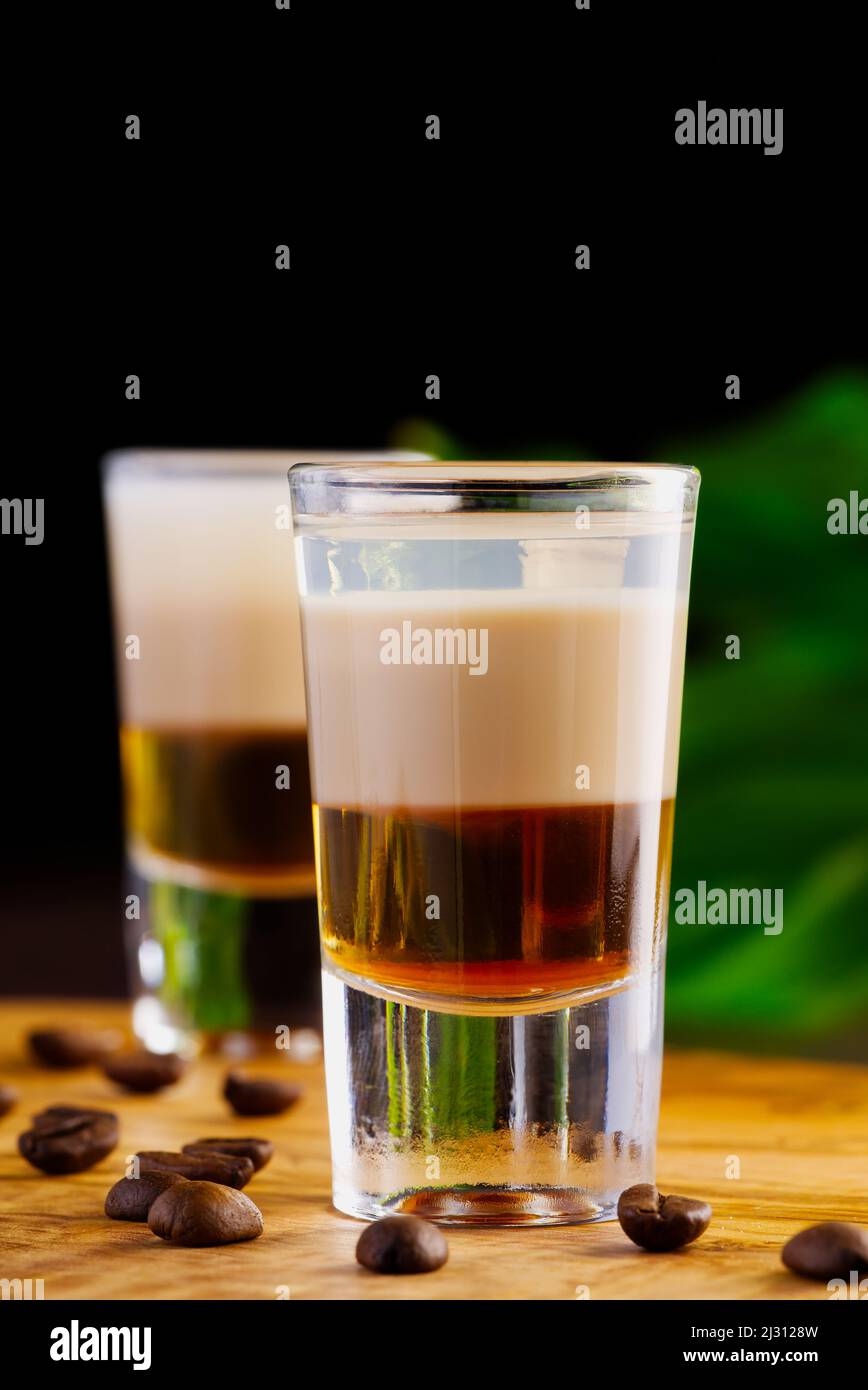 Shots of flaming B-52 cocktail placed on a bar counter. B-52 shot ...