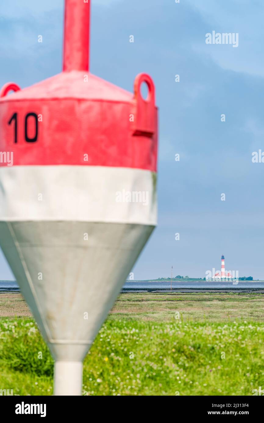 Road buoy, lighthouse, Westerhever, Schleswig-Holstein, Germany Stock ...