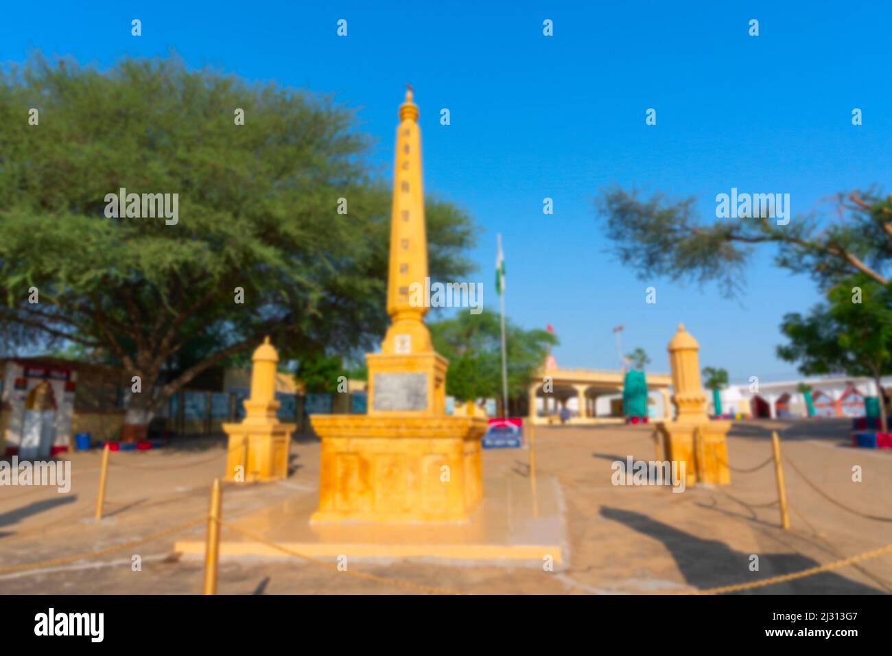Blurred image of Jaisalmer, Rajasthan, India. Memorials at Tanot Mata ...