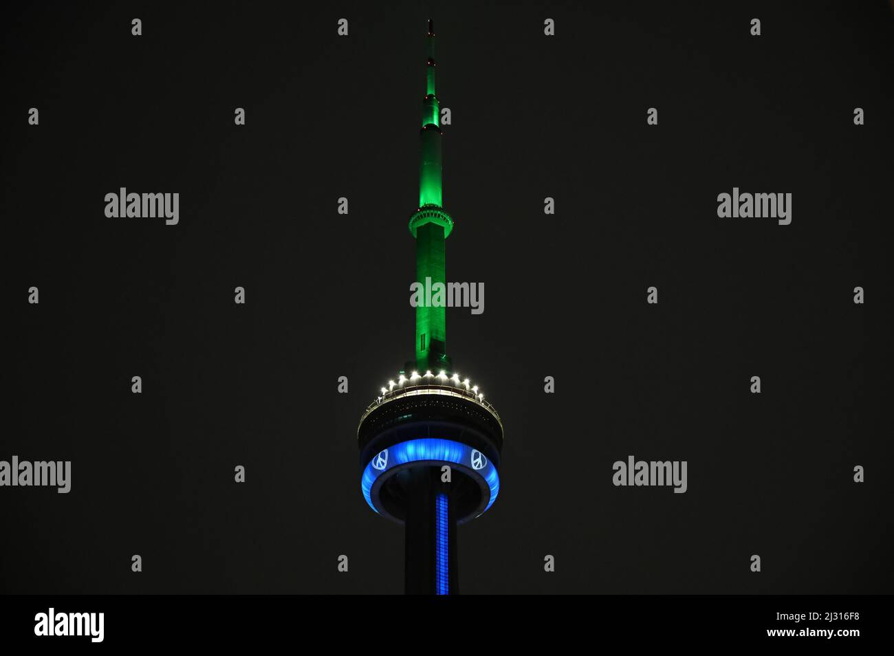 Toronto, Canada. 4th Apr 2022. The Peace symbol is displayed on the CN ...