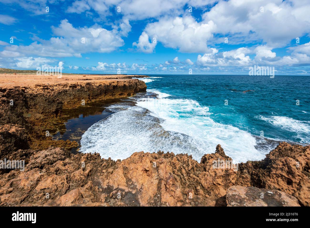 Dramatic view of the scenic rocky coastline at Quobba Blowholes, a ...
