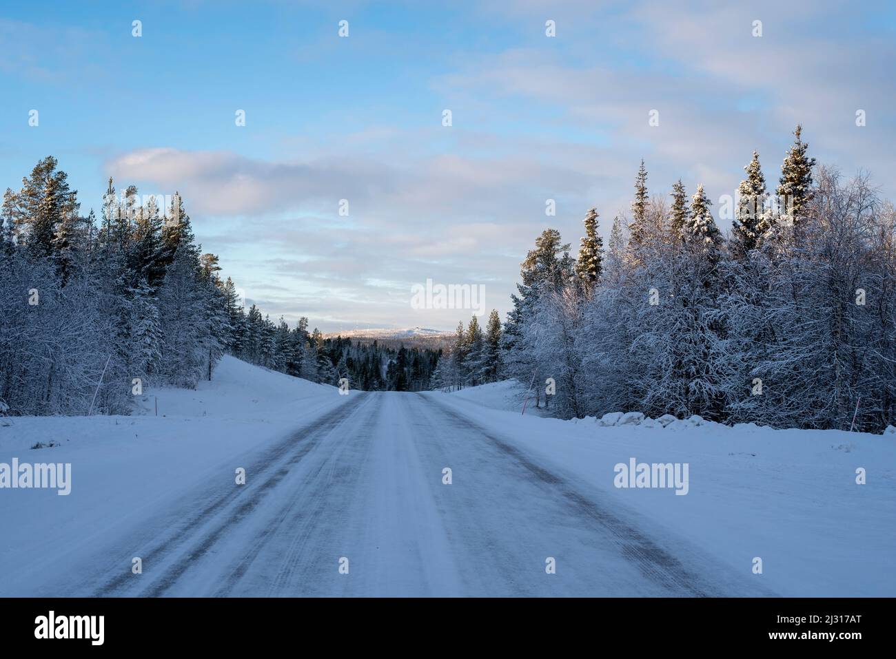 Snow-covered country road, Lapland, Finland Stock Photo - Alamy