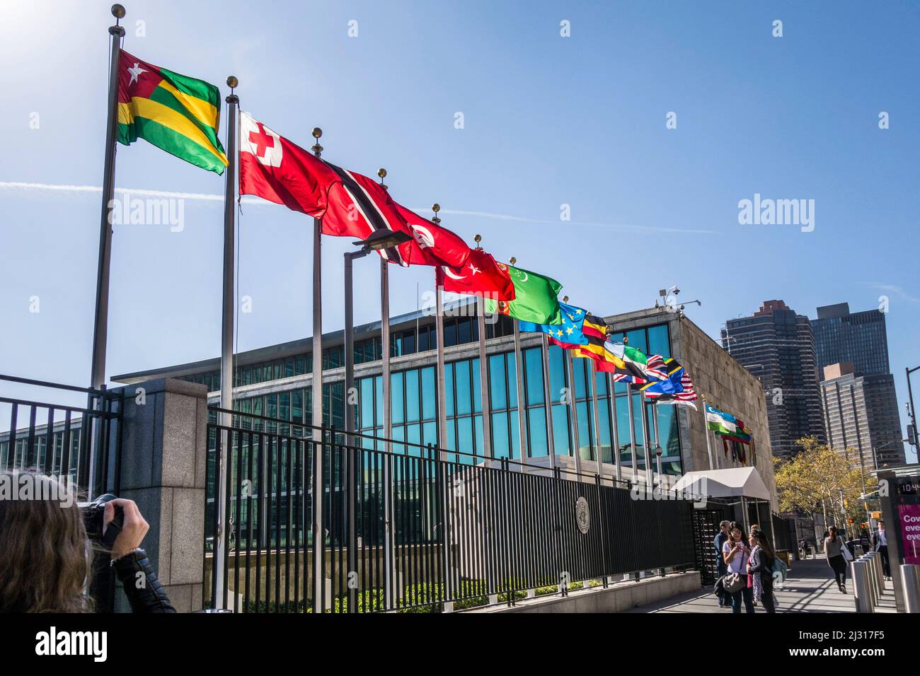NEW YORK, USA - OCT 5, 2017: UN Nations building with flags of ...