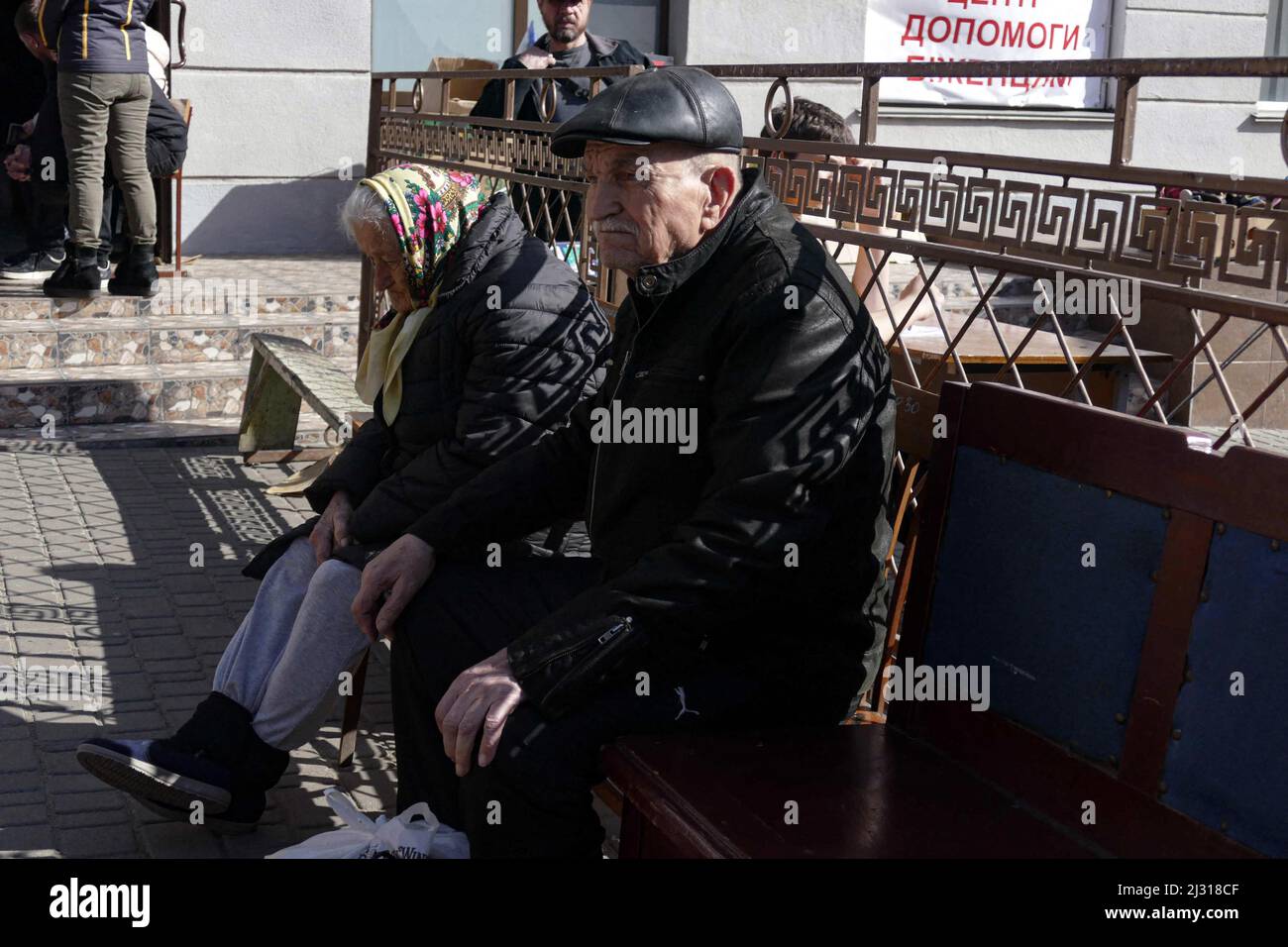 Elderly people are seen on the grounds of the IDP Assistance Center ...