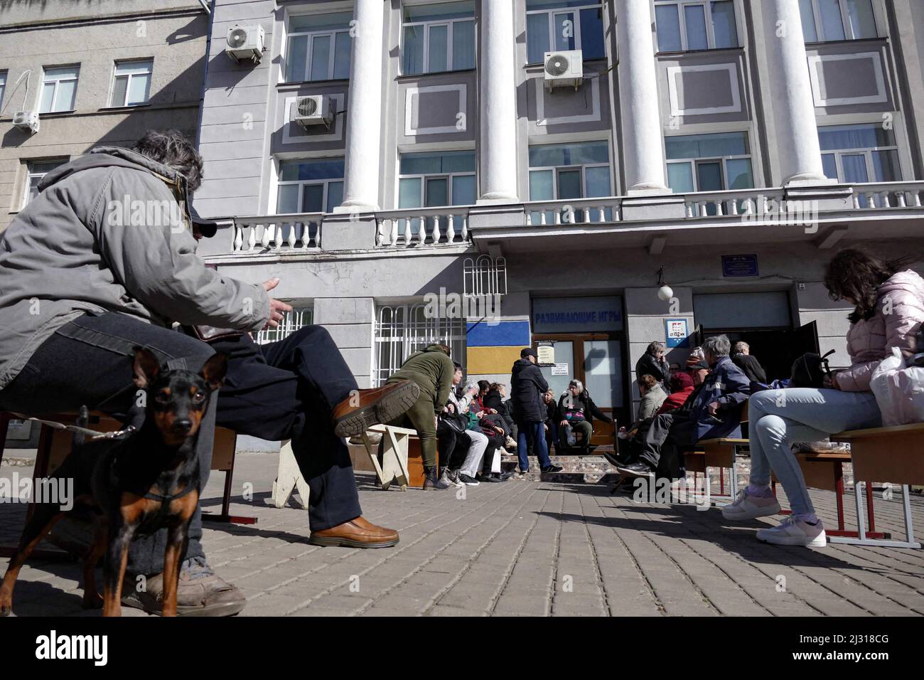 People are seen on the grounds of the IDP Assistance Center, Odesa ...