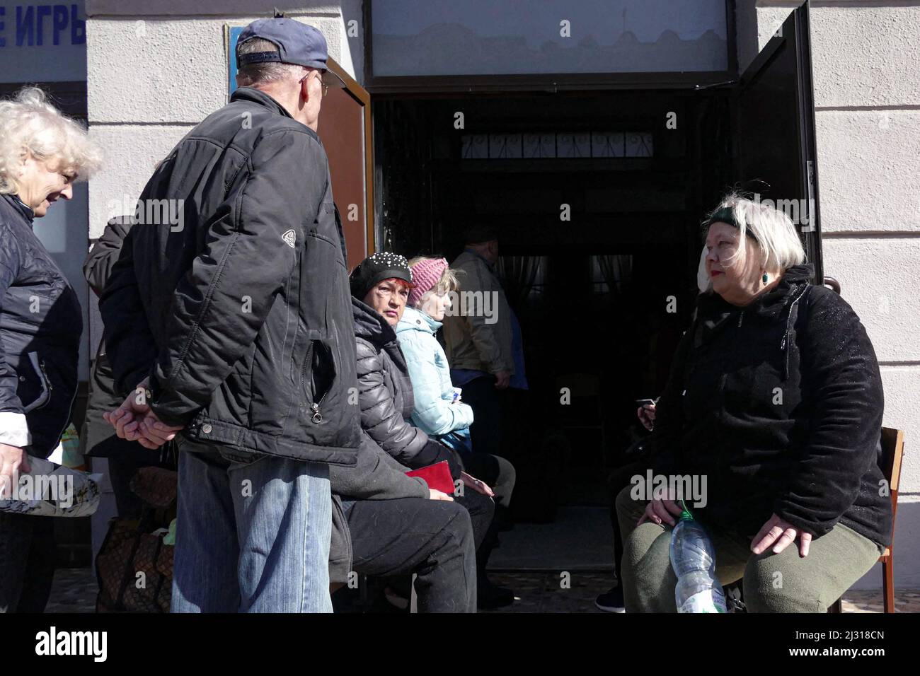 People are seen on the grounds of the IDP Assistance Center, Odesa ...
