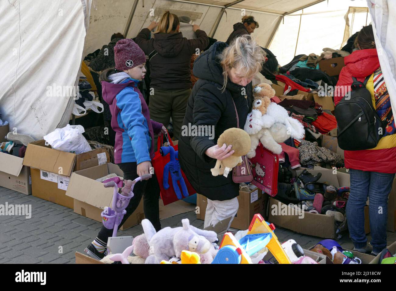 People are seen on the grounds of the IDP Assistance Center, Odesa ...