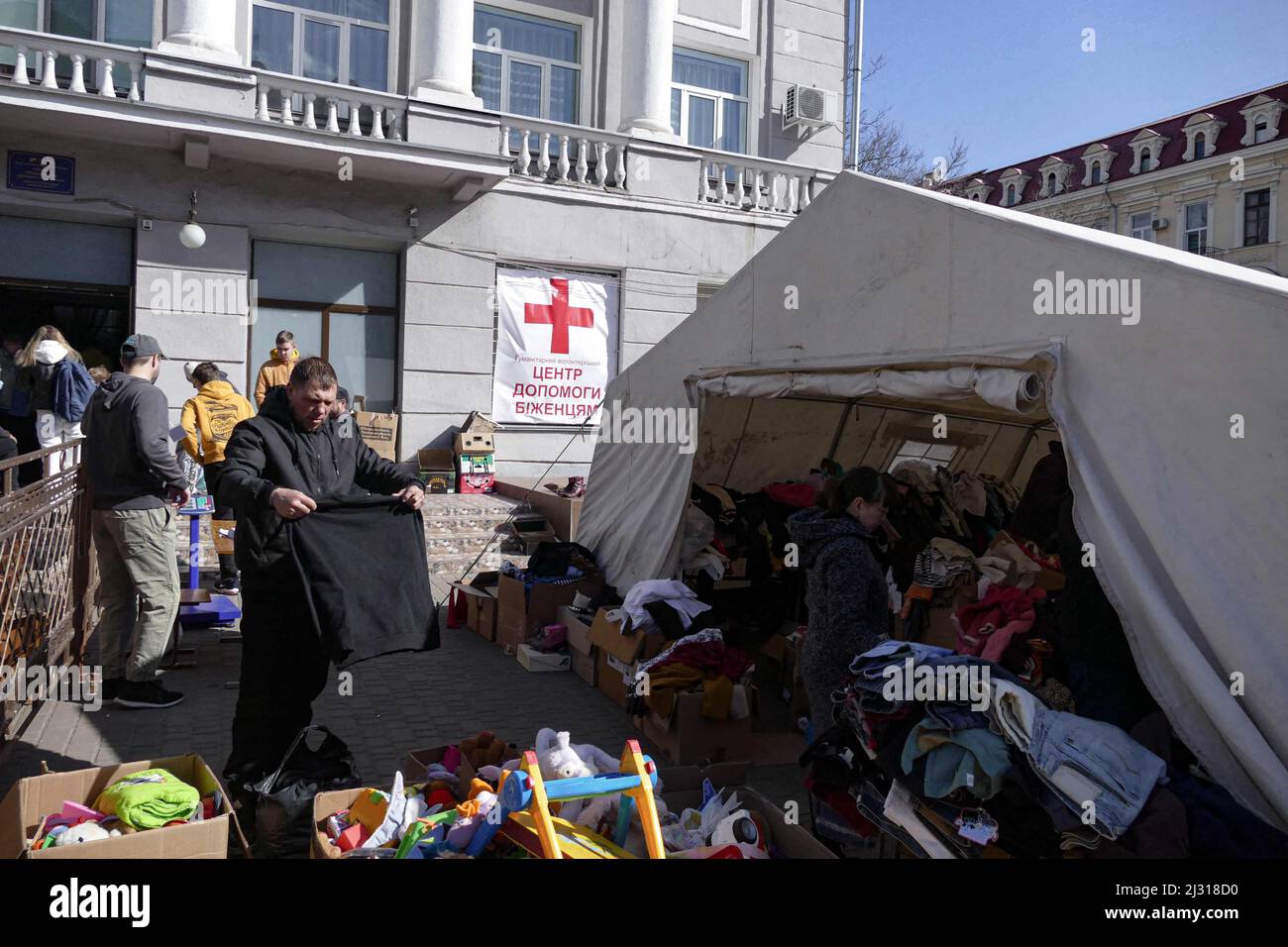 People are seen on the grounds of the IDP Assistance Center, Odesa ...