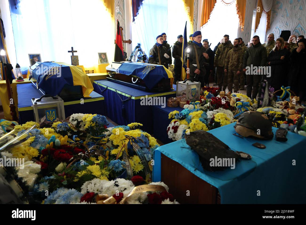 Coffins are seen during a funeral ceremony for Ukrainian defenders ...