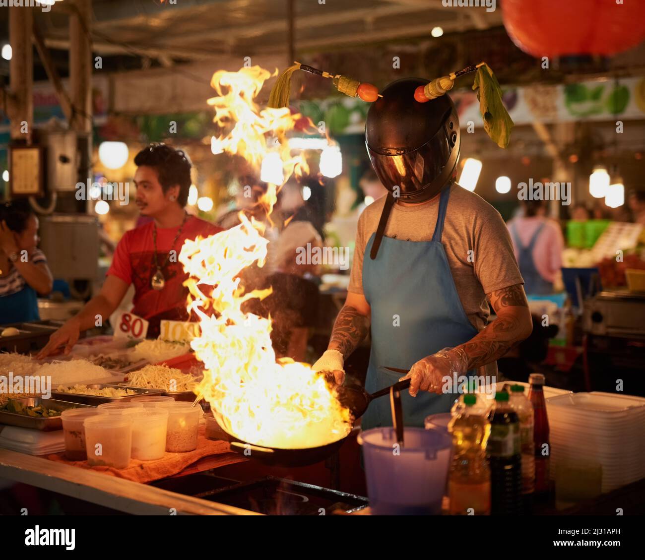 Chef flambeing food in pan hi-res stock photography and images - Alamy