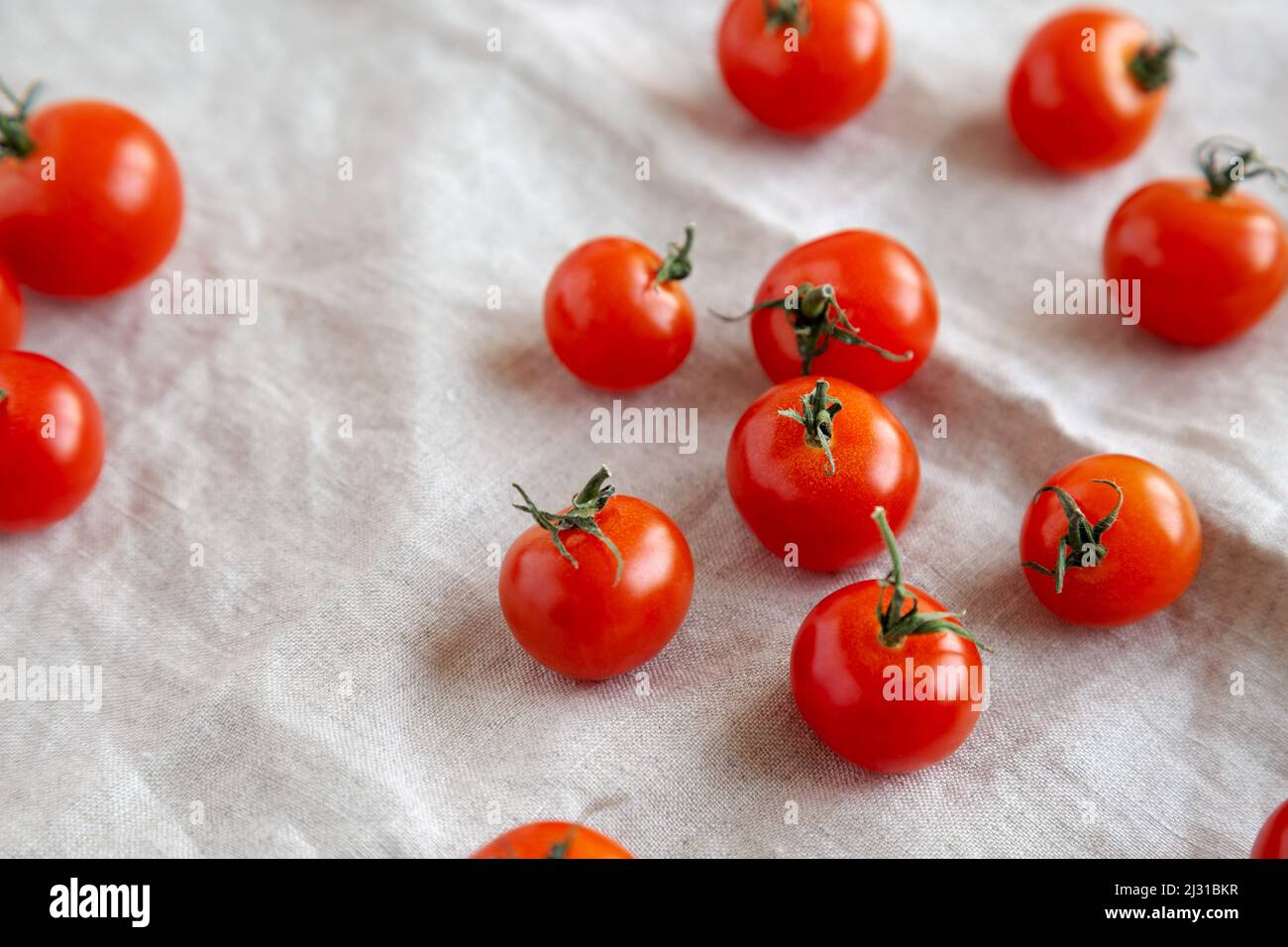 Ripe Red Cherry Tomatoes Ready to Eat, low angle view Stock Photo - Alamy
