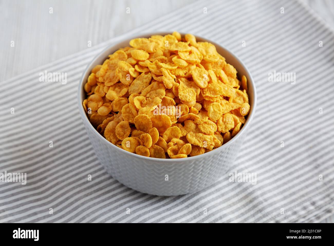 Tasty Corn Flakes in a Bowl, side view Stock Photo - Alamy