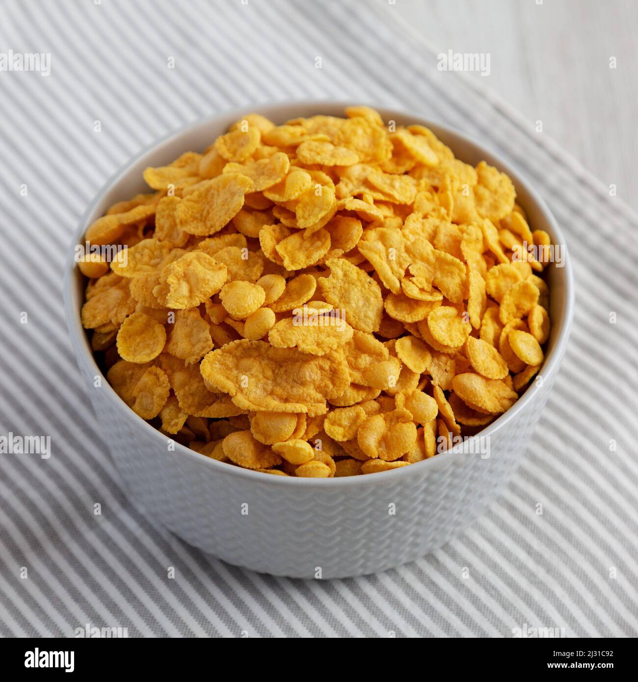 Tasty Corn Flakes in a Bowl, side view Stock Photo - Alamy