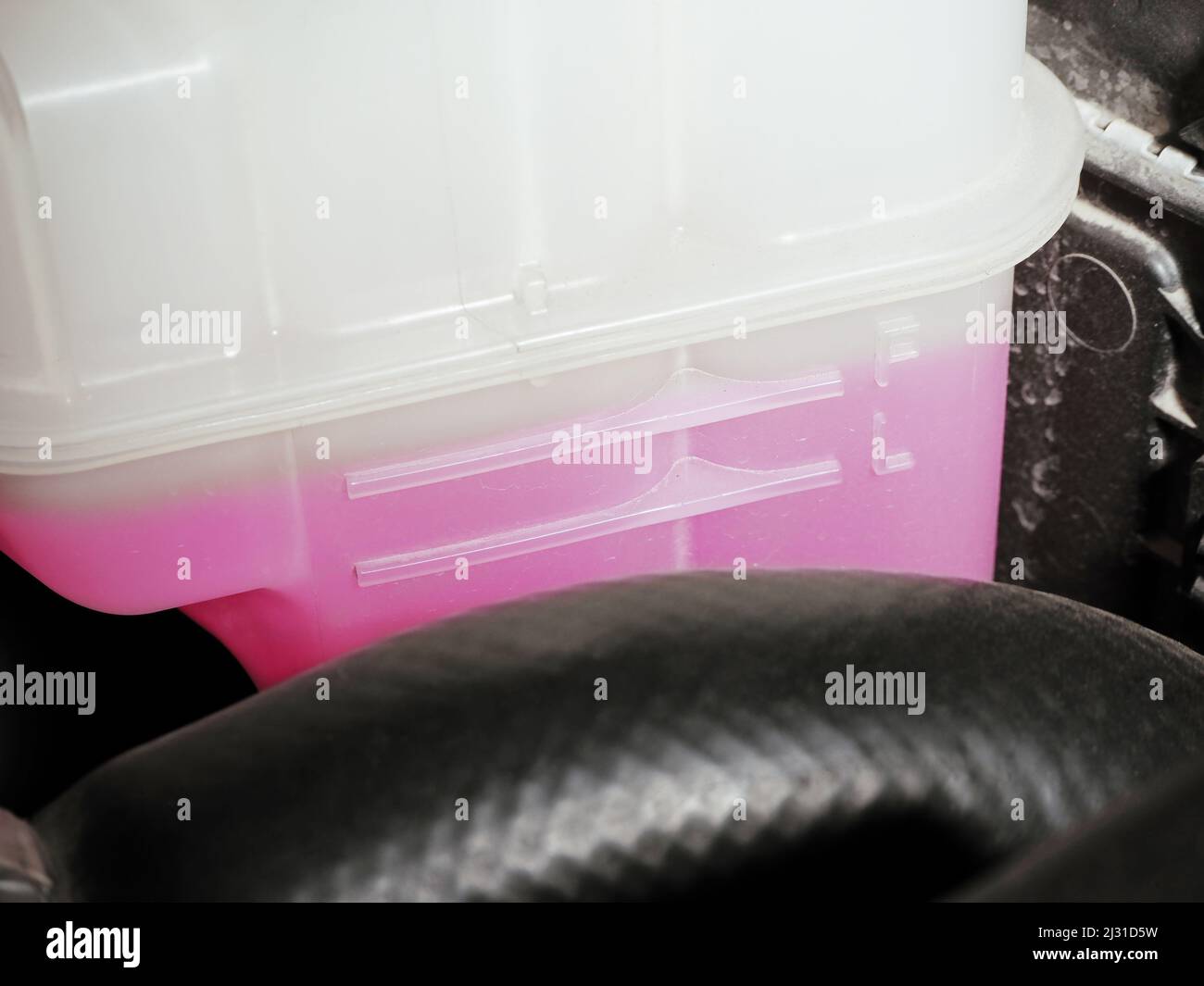 Indicates full and low levels in the coolant tank of the car radiator ...