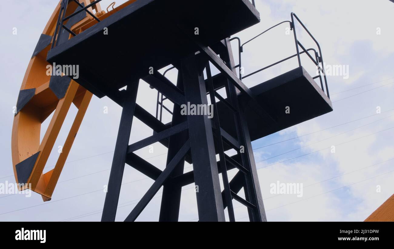 Oil rocking chair in Russia. The concept of oil production, refining ...