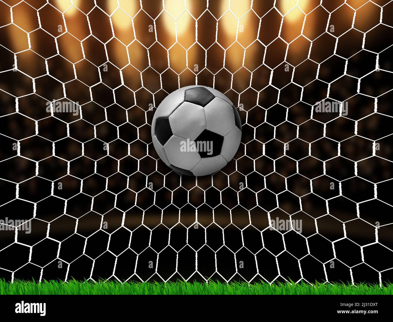 Soccer ball on goal with net Stock Photo - Alamy