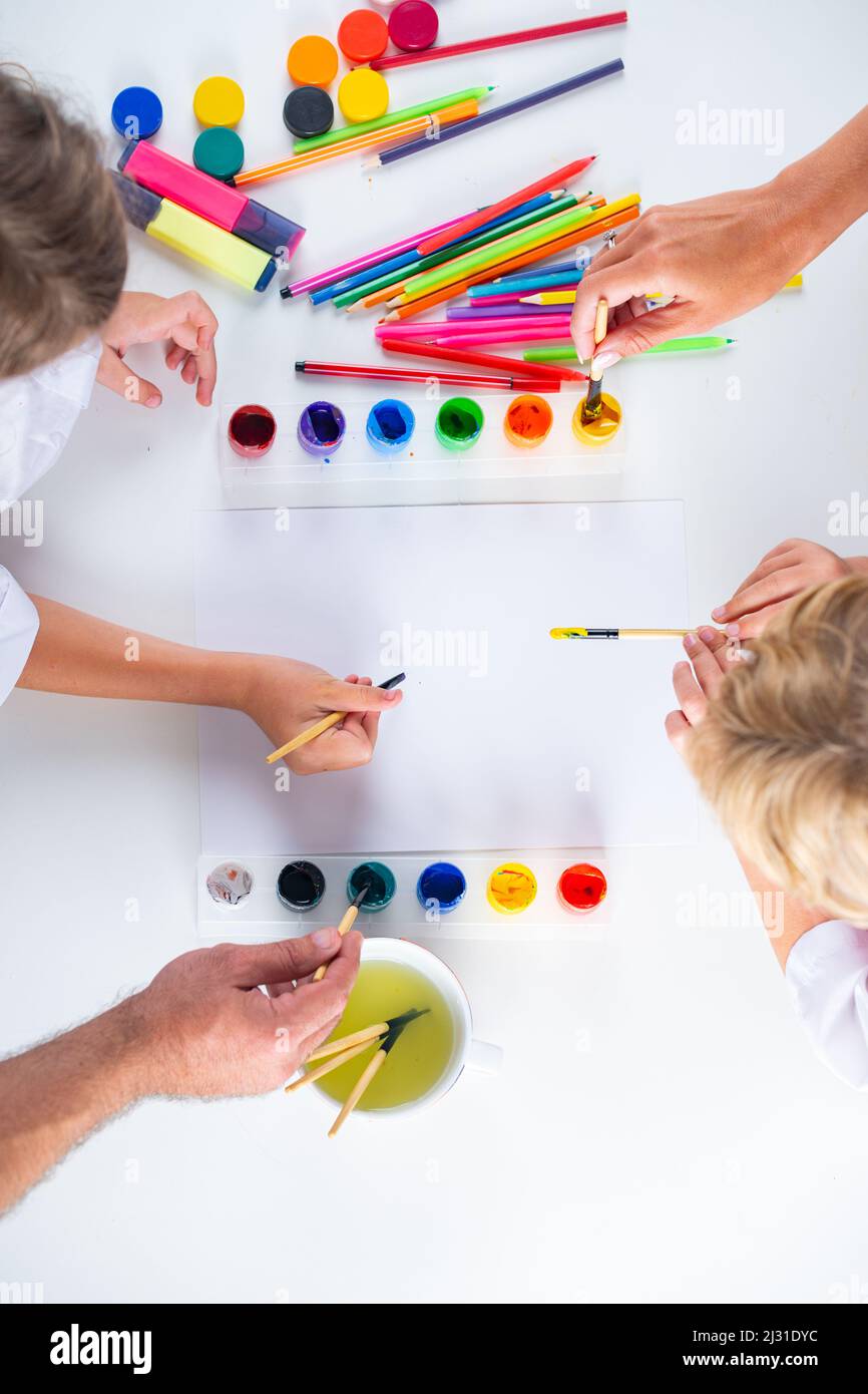 Humans hand is drawing with colorful pencils. Artist painting, drawing ...
