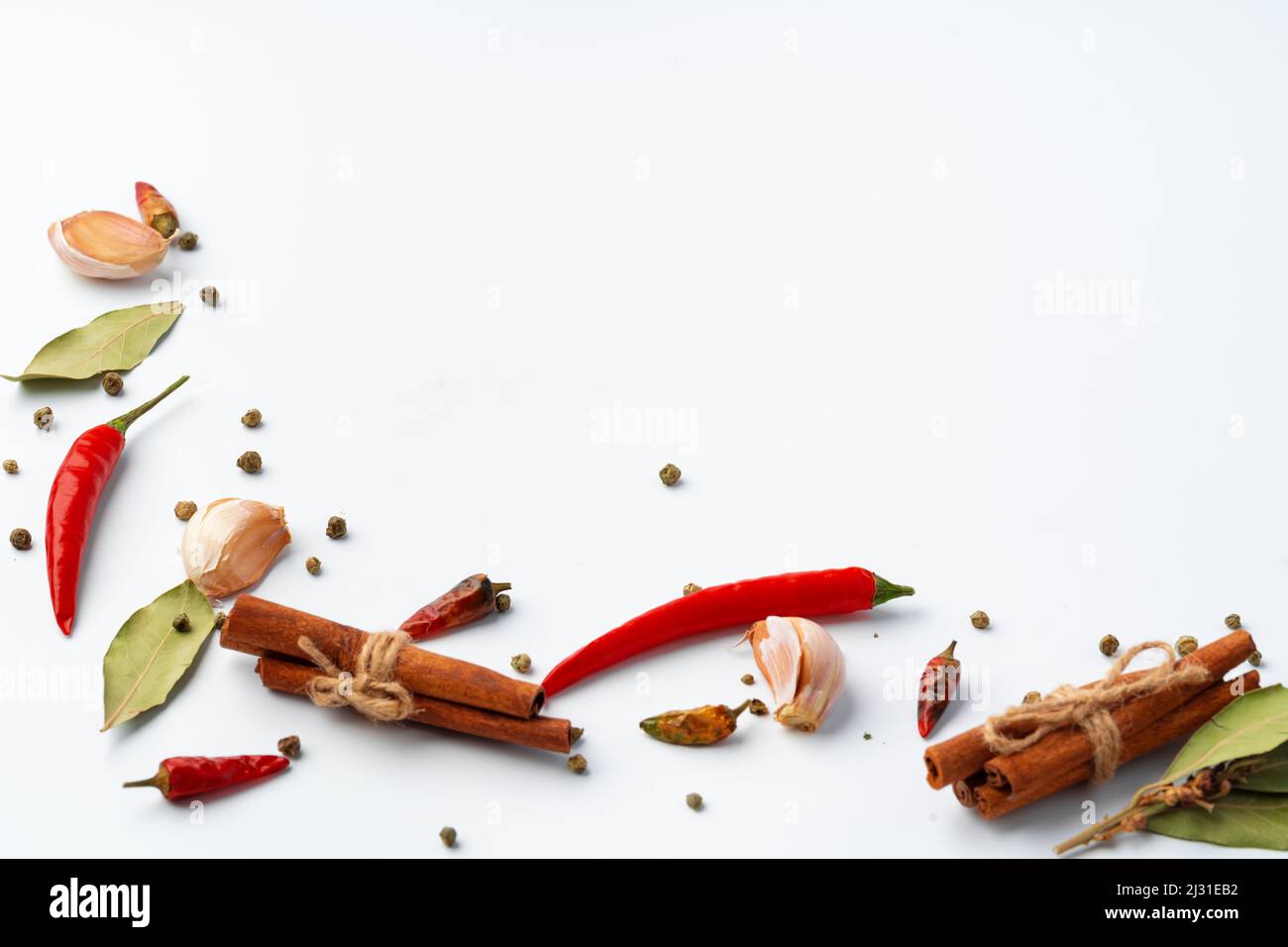Variety of cooking spices on white background Stock Photo - Alamy