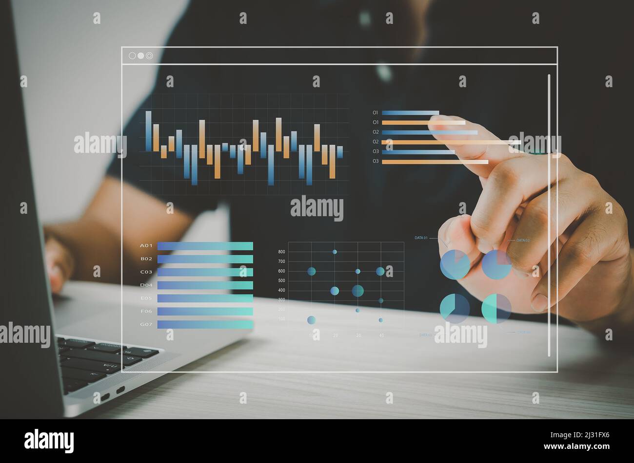 man hand using laptop to working technology.Hand toucing virtual screen graph and chart data ...