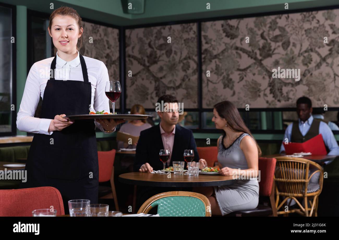 Attractive welcoming restaurant hi-res stock photography and images - Alamy