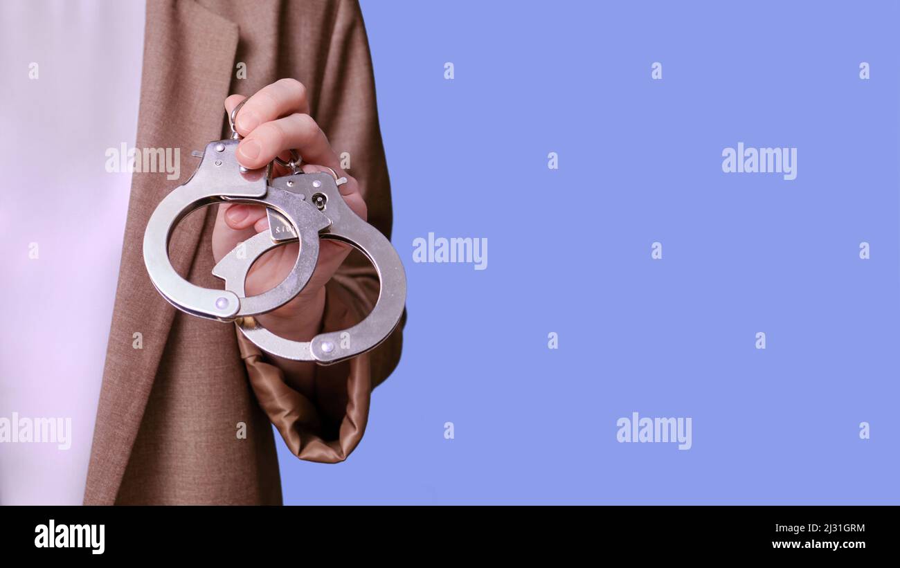 Woman handcuffed close up hi-res stock photography and images - Alamy