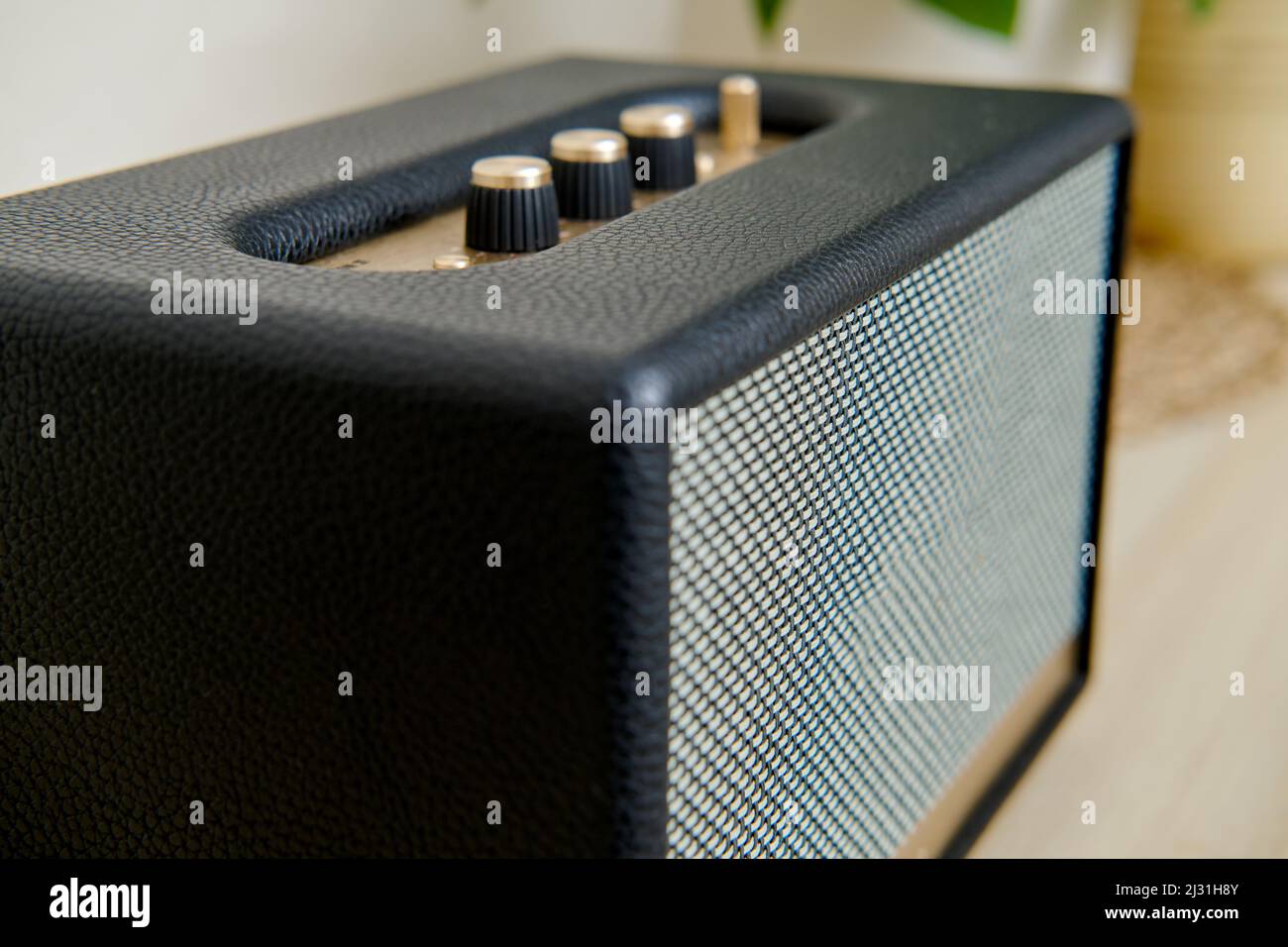 Acoustic music speaker in retro style. Vintage sound column in an old ...