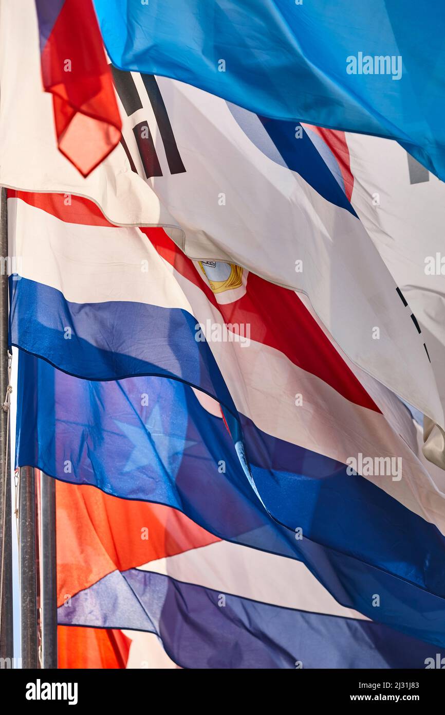 Flags of the word waving in the wind. Nation emblems Stock Photo - Alamy