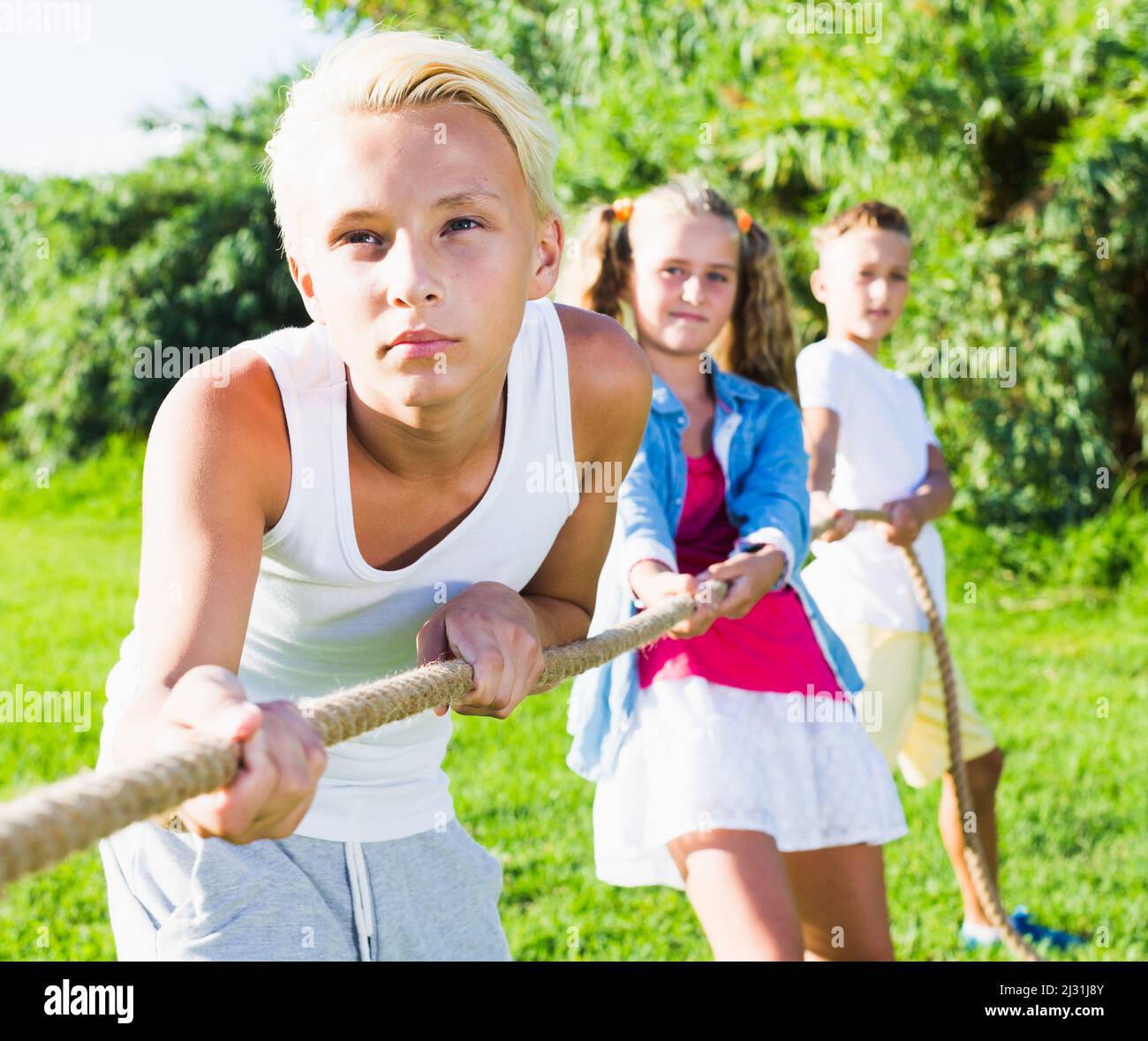 Tugging kids hi-res stock photography and images - Alamy
