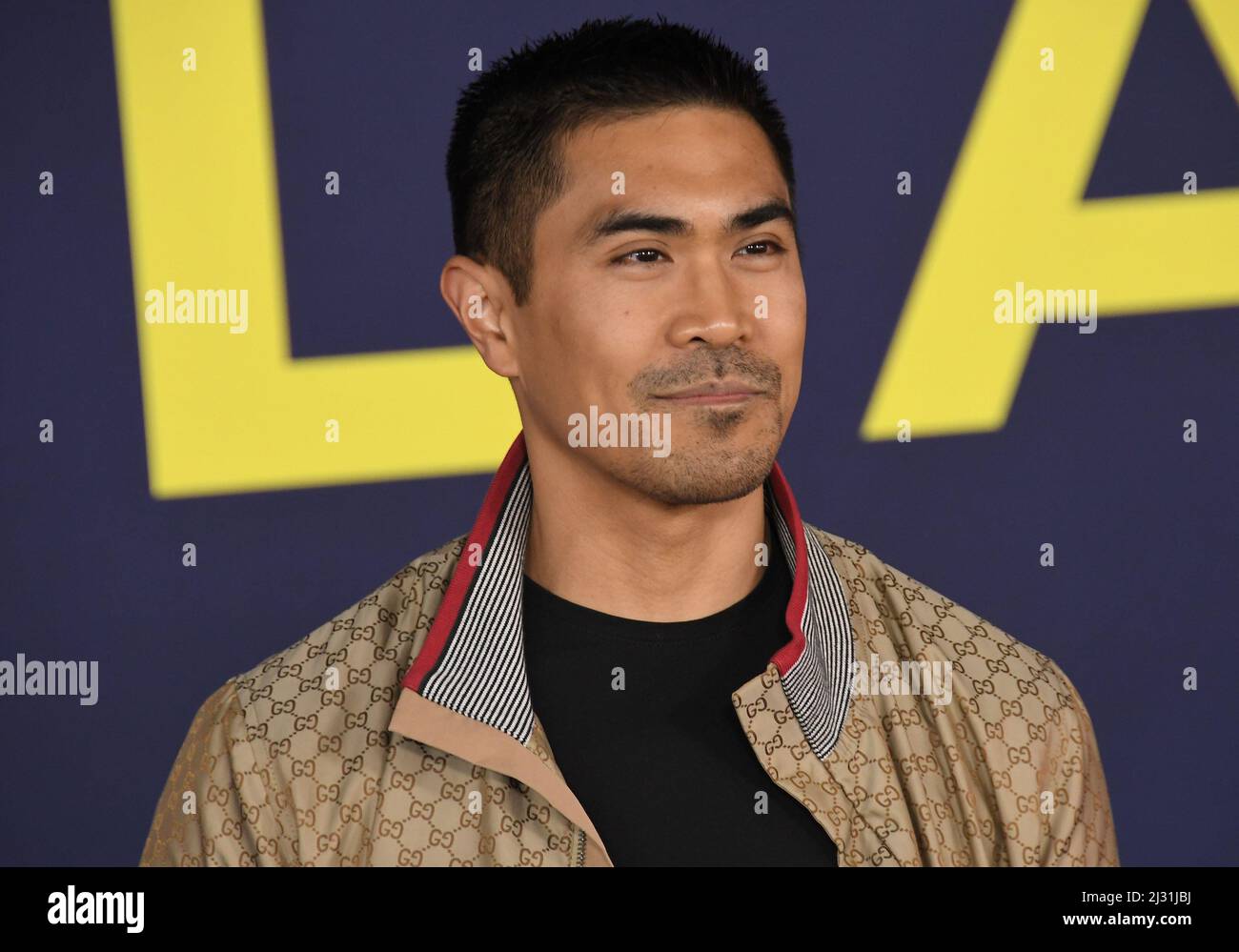 JB Tadena arrives at the AMBULANCE Los Angeles Premiere held at the Academy Museum of Motion ...