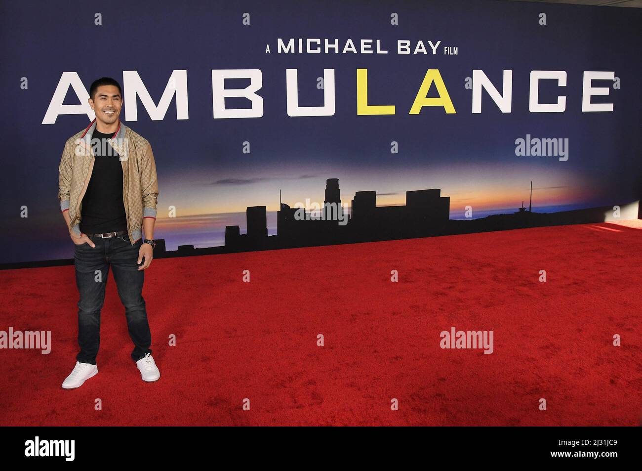 JB Tadena arrives at the AMBULANCE Los Angeles Premiere held at the ...