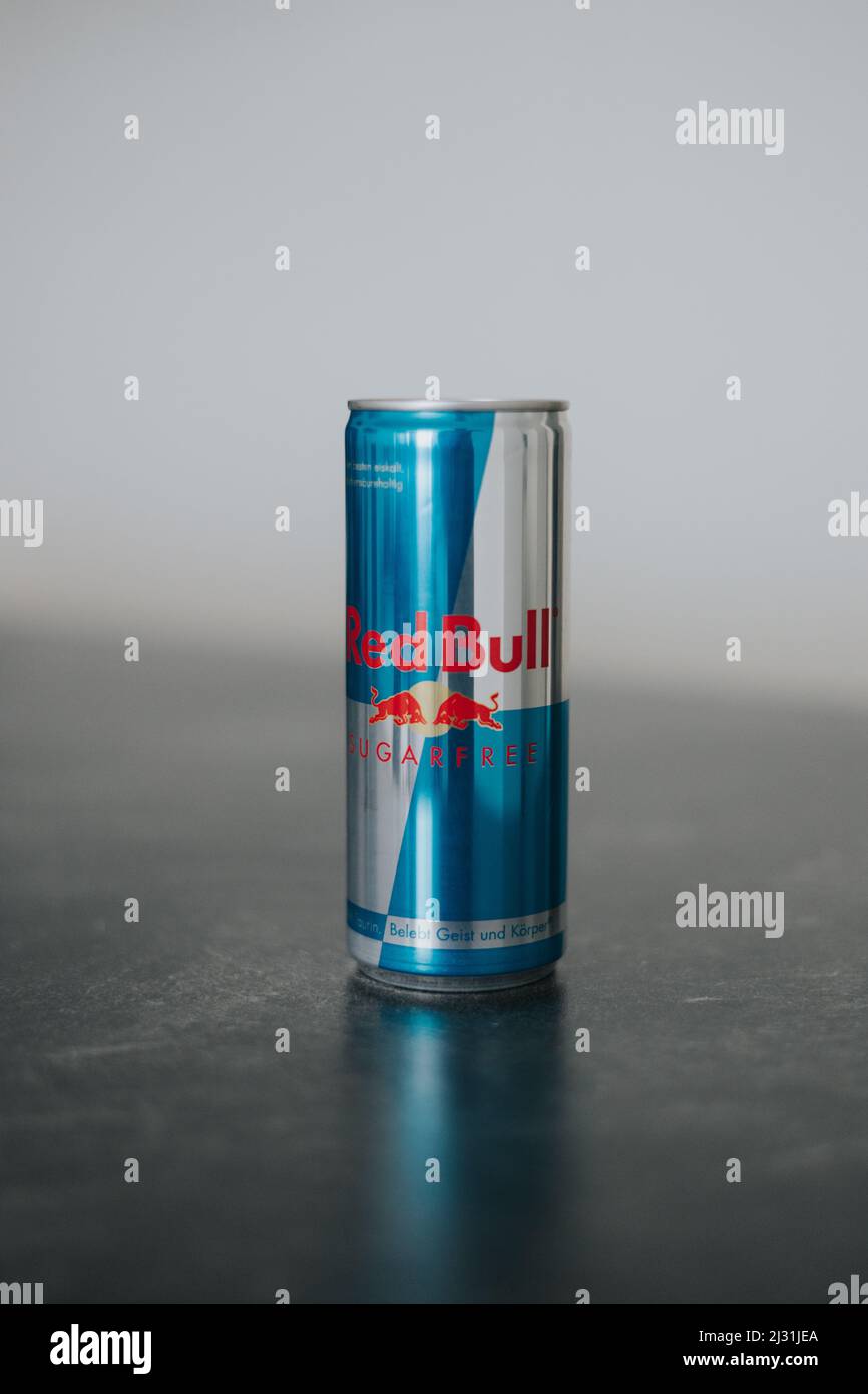 A vertical closeup shot of a Red Bull sugar free energy drink on the ...