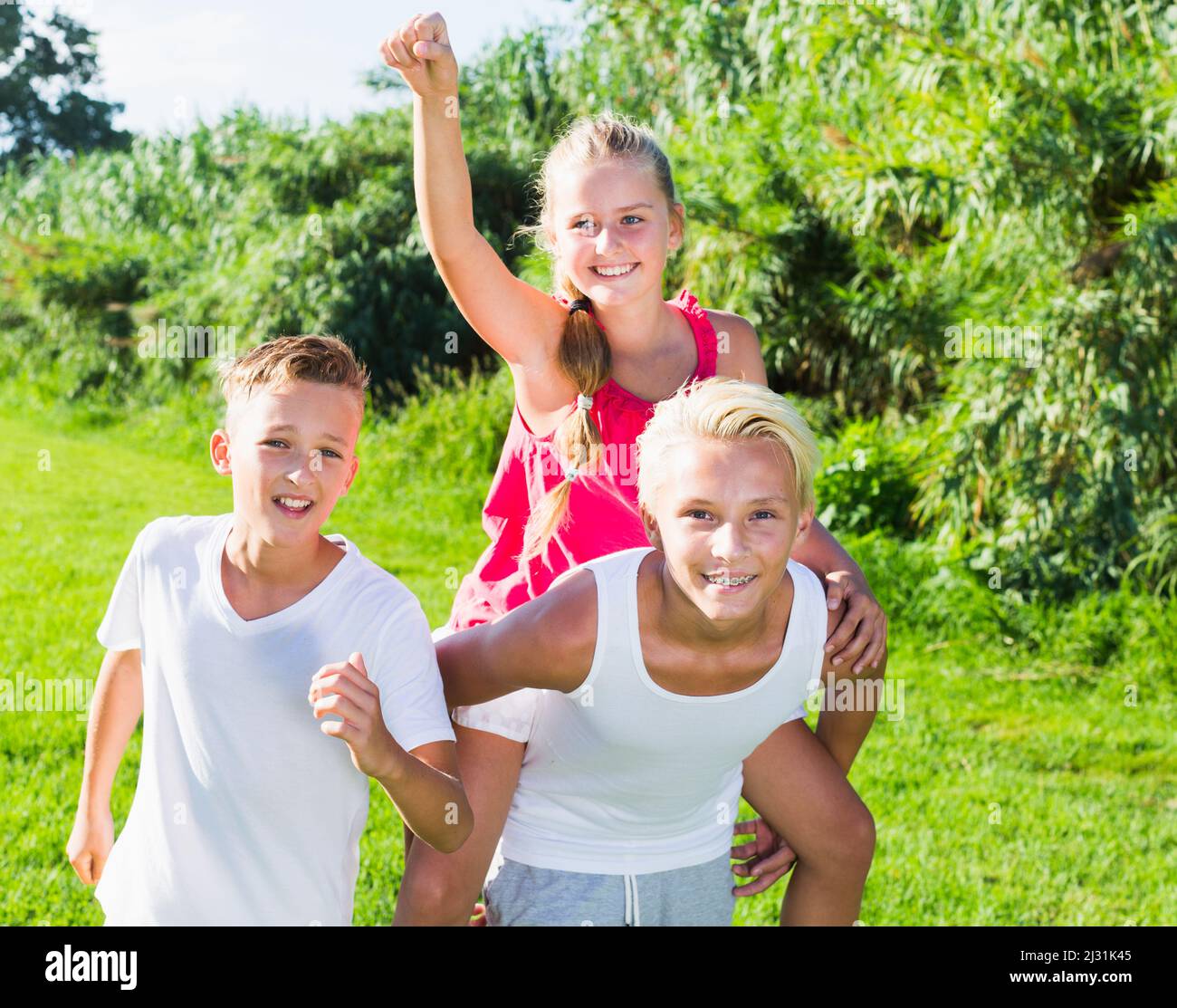 Running smiling laughing friendship togetherness hi-res stock ...