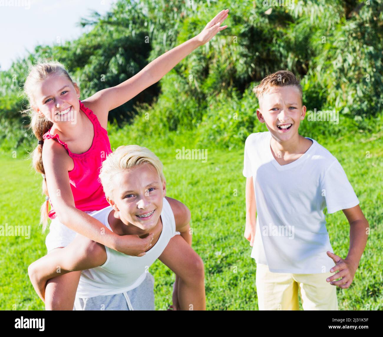 Running smiling laughing friendship togetherness hi-res stock ...