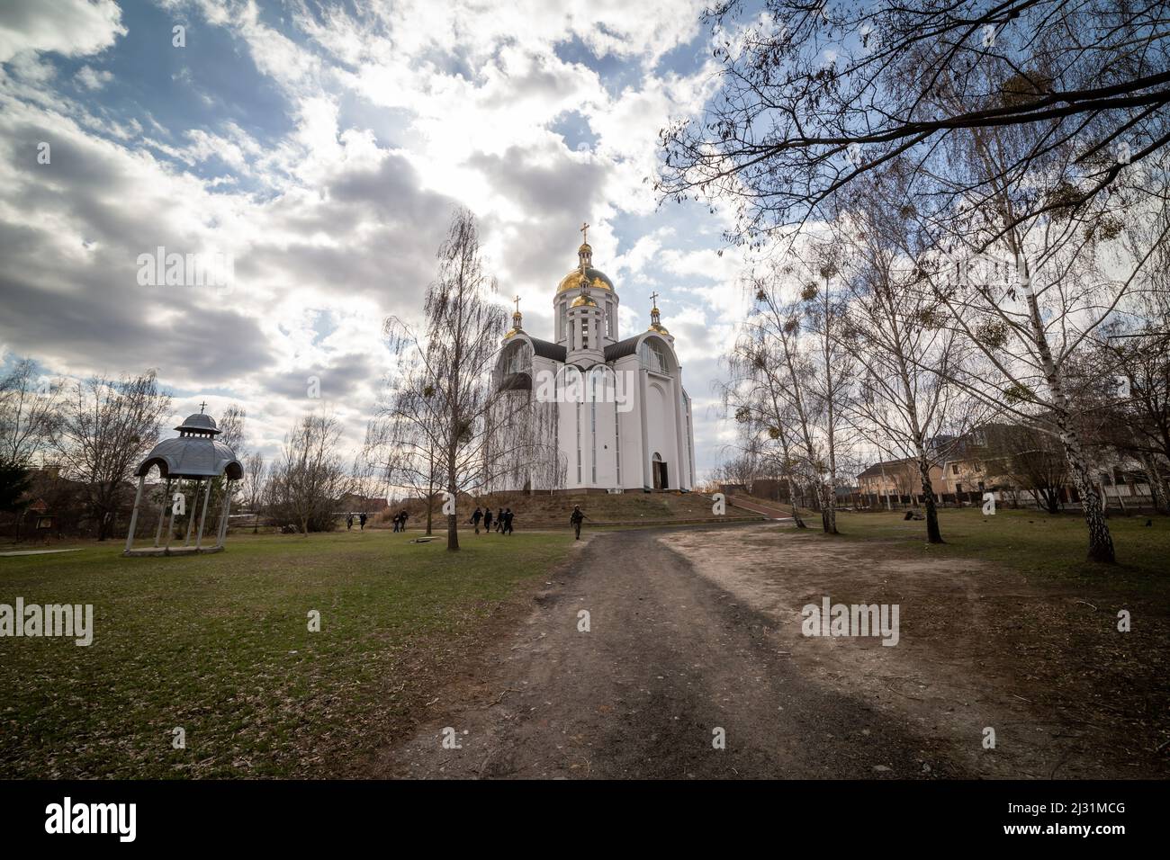 Church of St. Andrew in Bucha, Ukraine, behind which is a mass grave, 4 ...