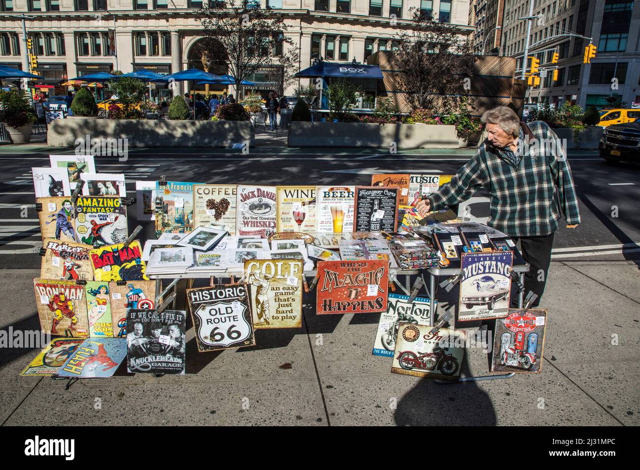NEW YORK, USA - OCT 5, 2017: man sells replika of old vintage enamel ...