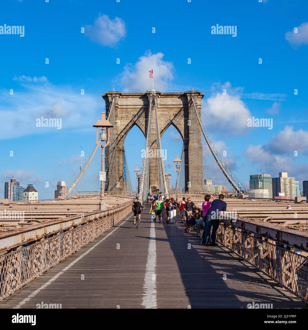 New York, USA - July 9, 2010: Tourists and residents cross Brooklyn ...