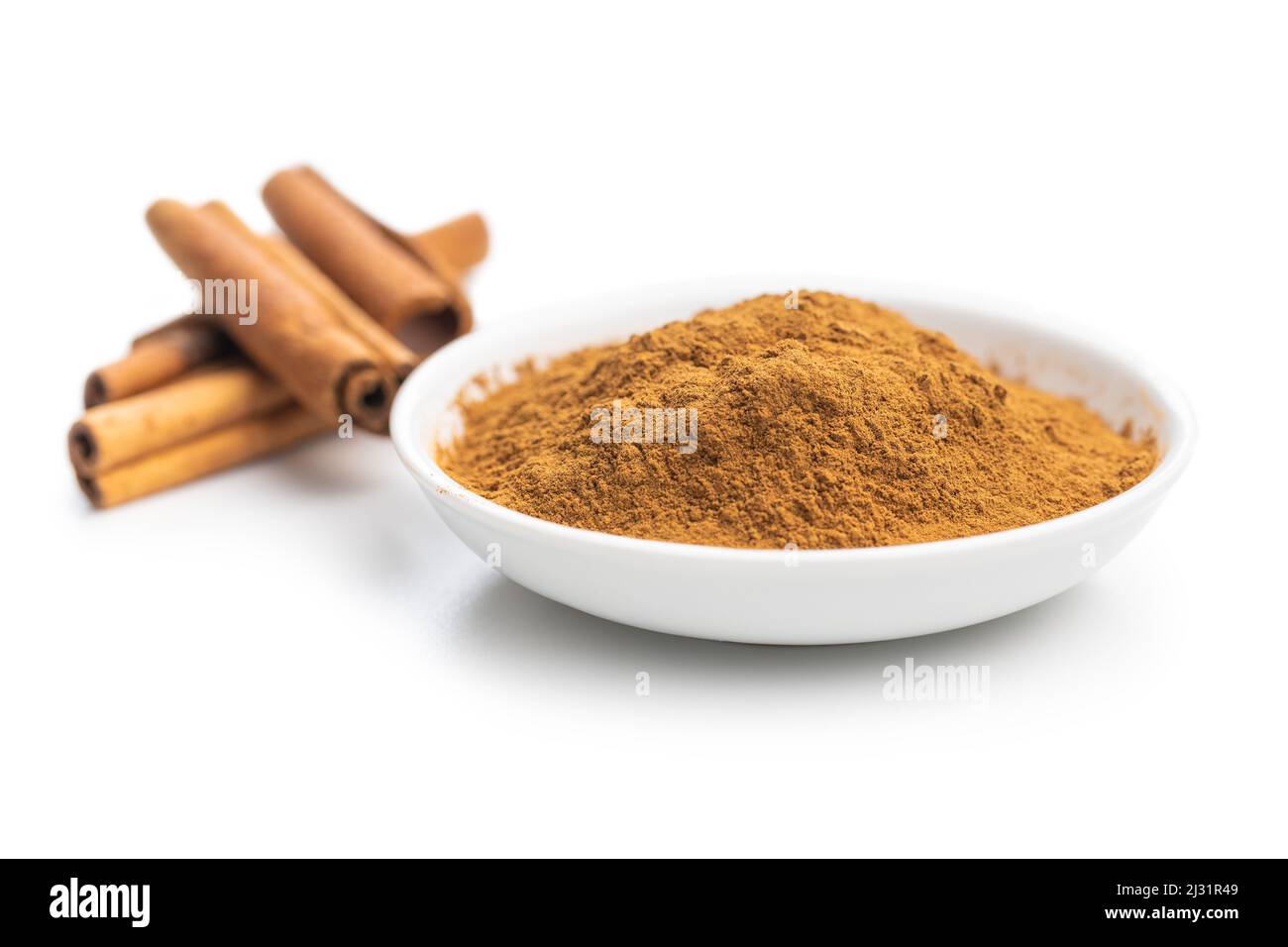 Cinnamon powder isolated on a white background. Cinnamon spice Stock ...