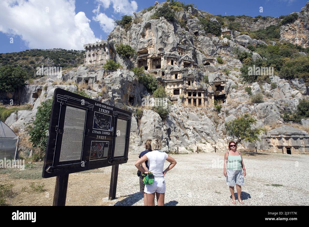 Tourists at the antiqe rock tombs of Myra, Demre, Anatolia, ancient ...