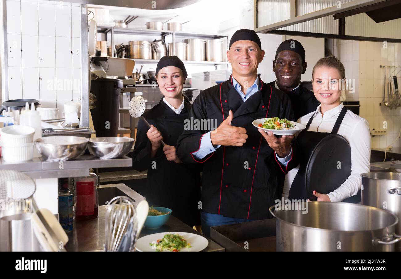 Confident team of chefs Stock Photo - Alamy