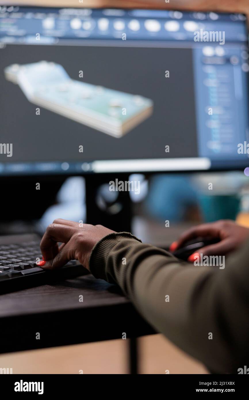 Close up of digital artist working on 3D model to improve geometry and ...