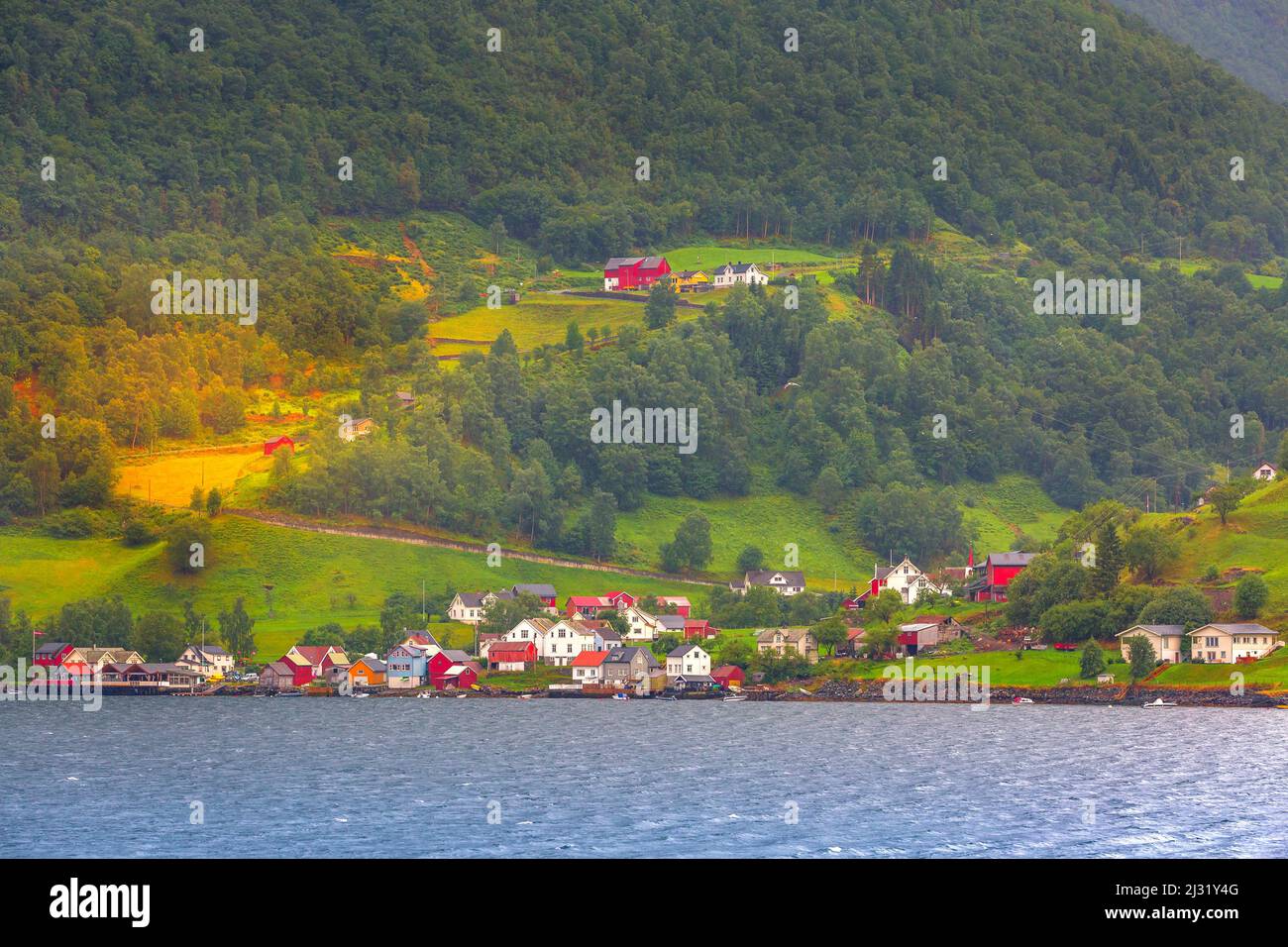 Amazing panoramic nature view with fjord and mountain village in Norway ...