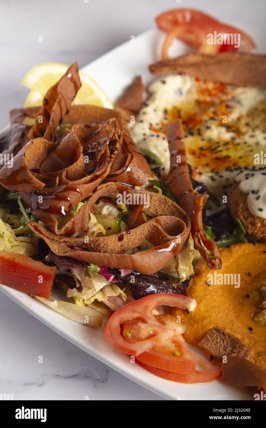 A vertical close-up of a typical Lebanese dish with fatuch Stock Photo ...