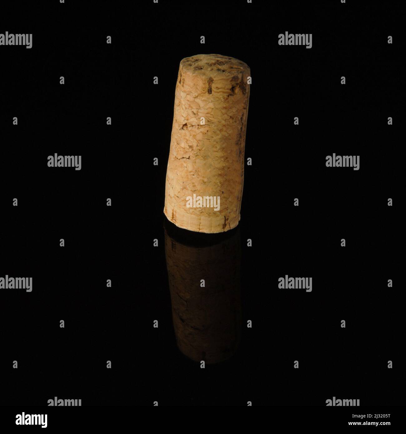 A close-up shot of a wine cork on a reflecting surface Stock Photo - Alamy